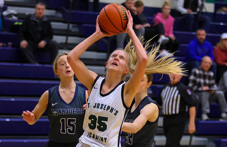 St. Joseph's Kayla Jansen flexes basketball muscle before St. Louis U ...