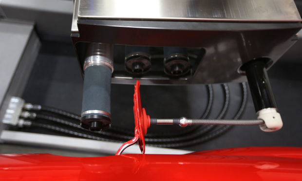 Robogas? Pacific company's robotic fuel pump fills the tank while you ...