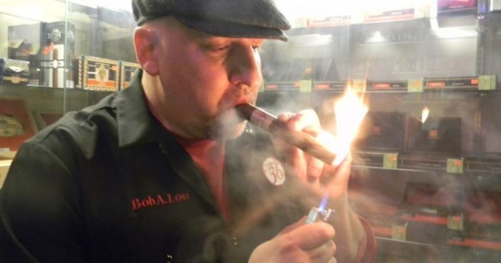 Stogie lovers light up for National Smoke a Cigar Day