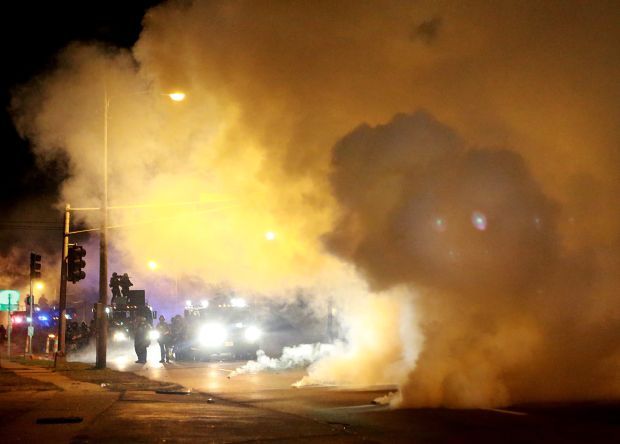 Tense tally in Ferguson includes fires, shootings and 31 arrests