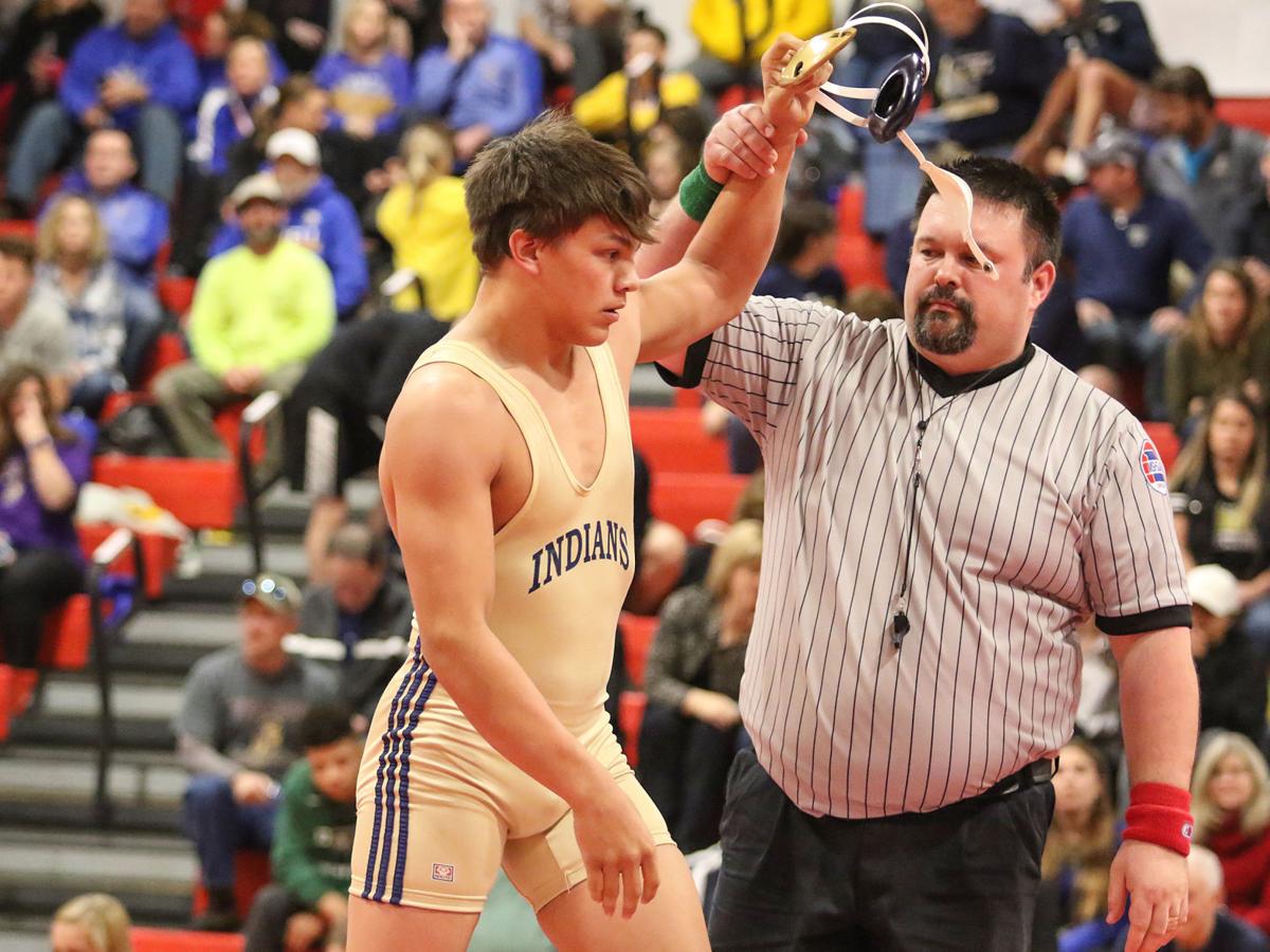 Hawks' four first-period pins help Holt capture GAC title | Wrestling ...