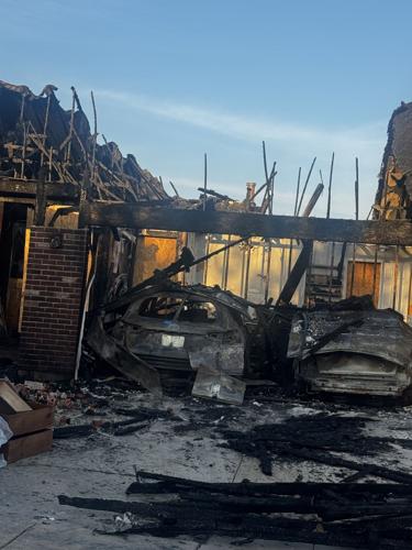 Passerby pulls residents from Wildwood house fire