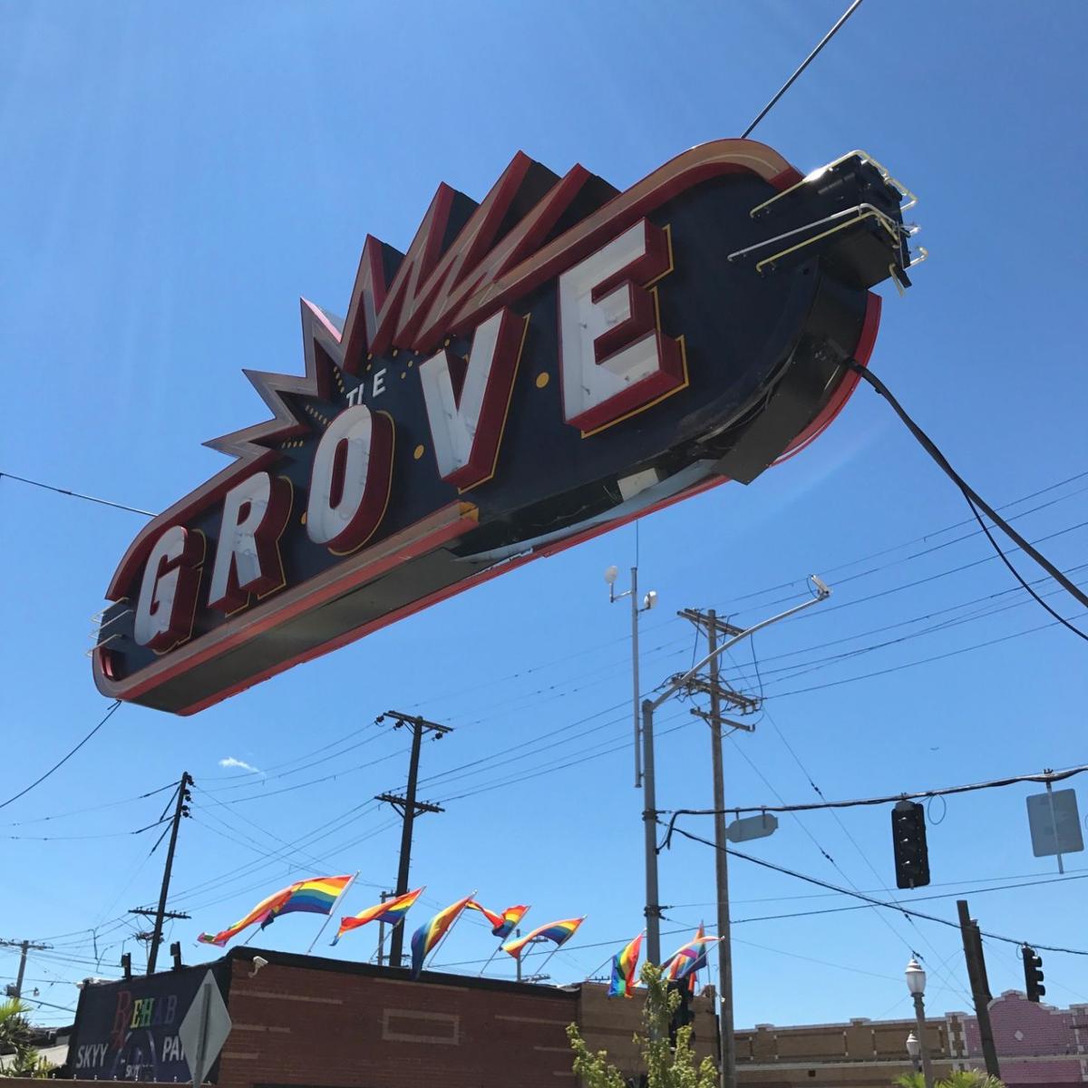 Oops: Trash truck takes out part of the iconic Grove sign