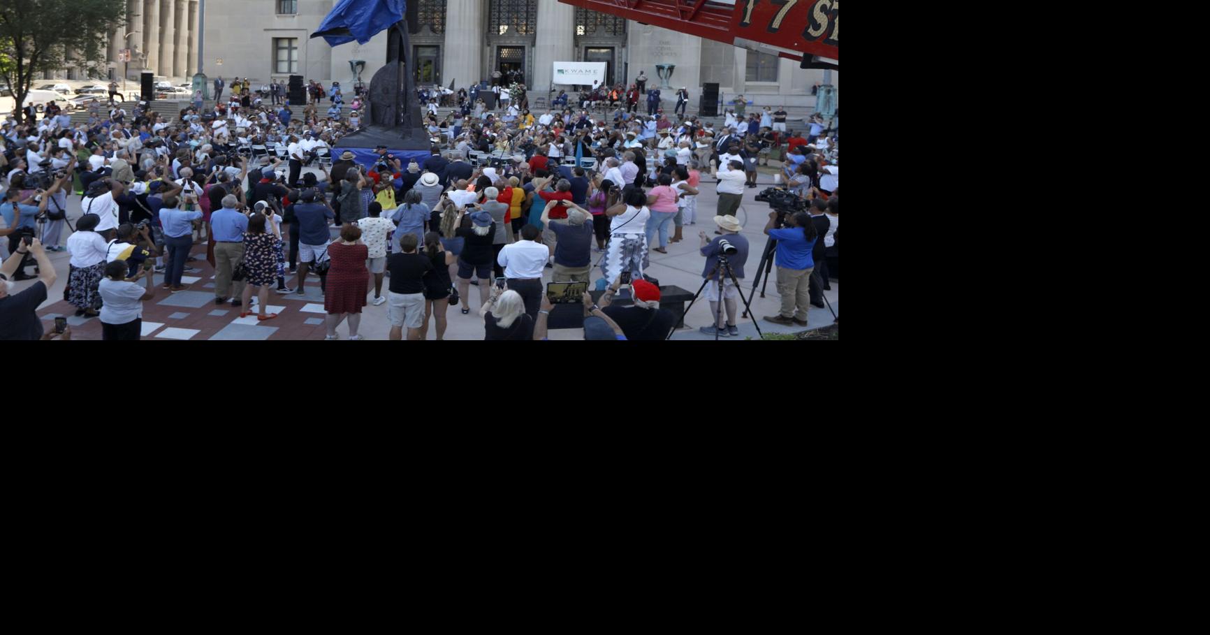 Photos: Hundreds attend unveiling of Freedom Suits Memorial Statue