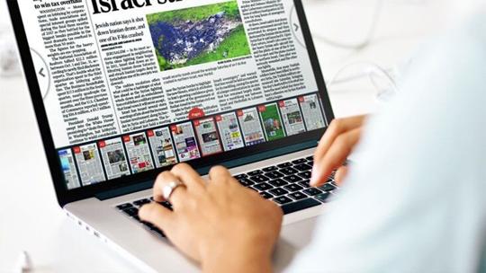 Read the paper online with our E-edition!