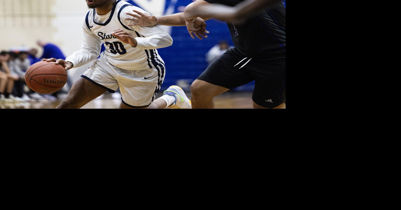 McCluer North wins boys basketball game over Parkway North