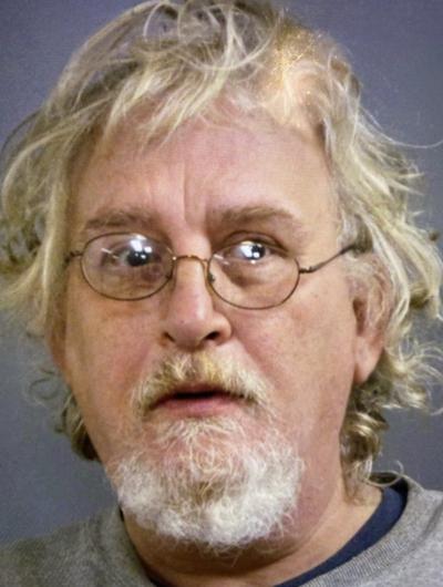 Man with beard, Santa hat charged after robbing Bridgeton credit union ...