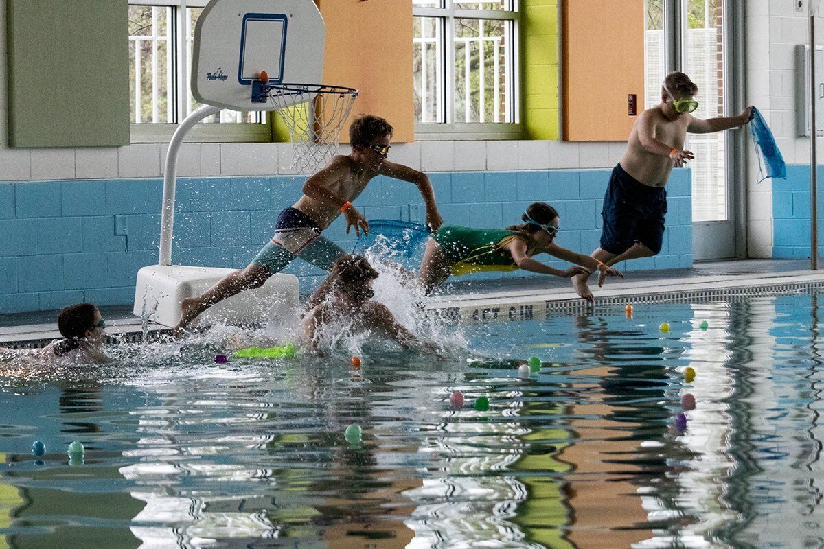 Photos: Kids hop into Ballwin pool for an underwater Easter egg hunt
