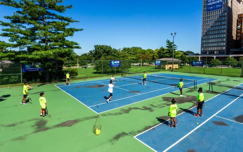 MICDS senior Motwani serves community through ACE Academy tennis camp