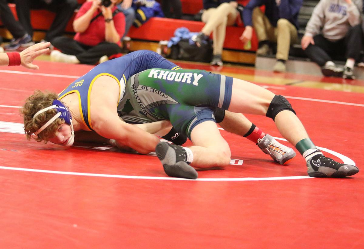 Hawks' four first-period pins help Holt capture GAC title | Wrestling ...