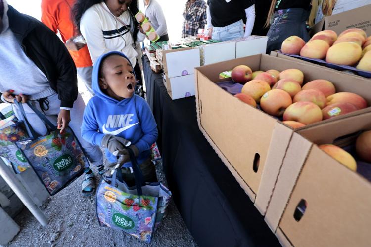 Residents line up for North St. Louis distribution event