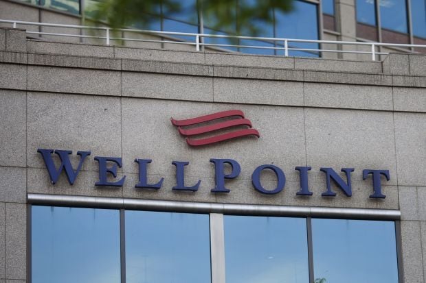 Insurer WellPoint raises 2014 earnings forecast