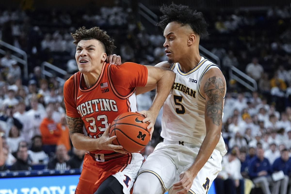 Coleman Hawkins scores 21 to lead No. 14 Illinois past Michigan