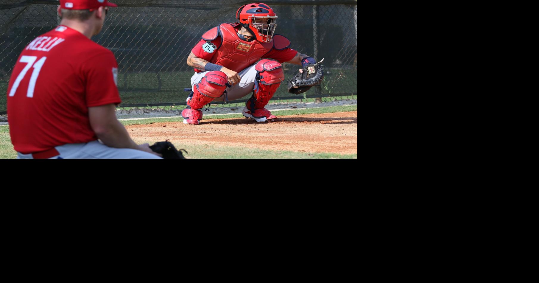 Molina, Matheny run rookie Kelly through catching drills