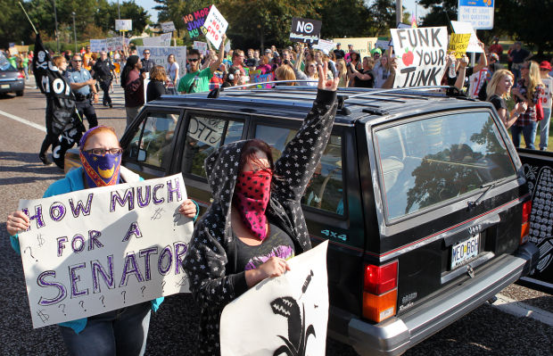 Hundreds protest outside Monsanto headquarters in St. Louis
