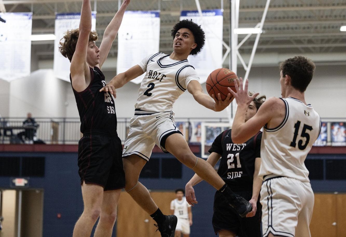 St. Dominic Christmas Tournament, first round: Holt 61, St. Charles West 44