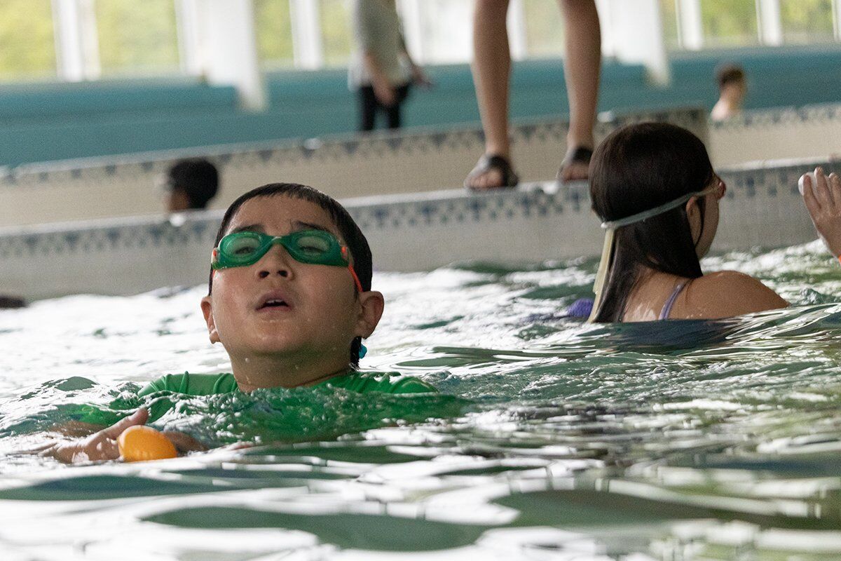 Photos: Kids hop into Ballwin pool for an underwater Easter egg hunt