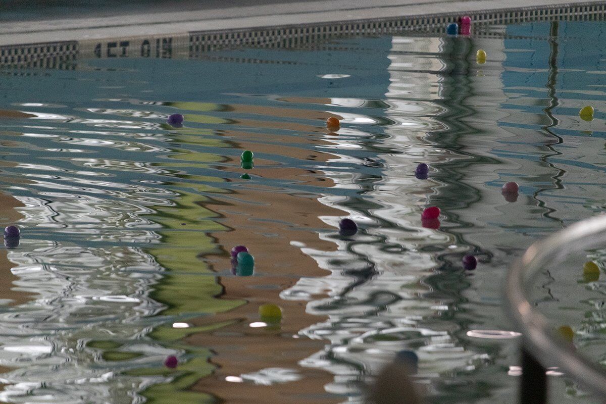 Photos: Kids hop into Ballwin pool for an underwater Easter egg hunt