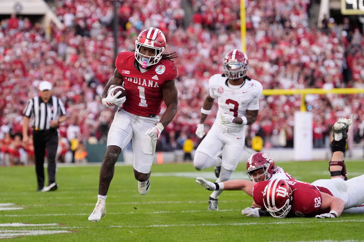 Strong ground games propel Indiana, Oregon to CFP semifinals