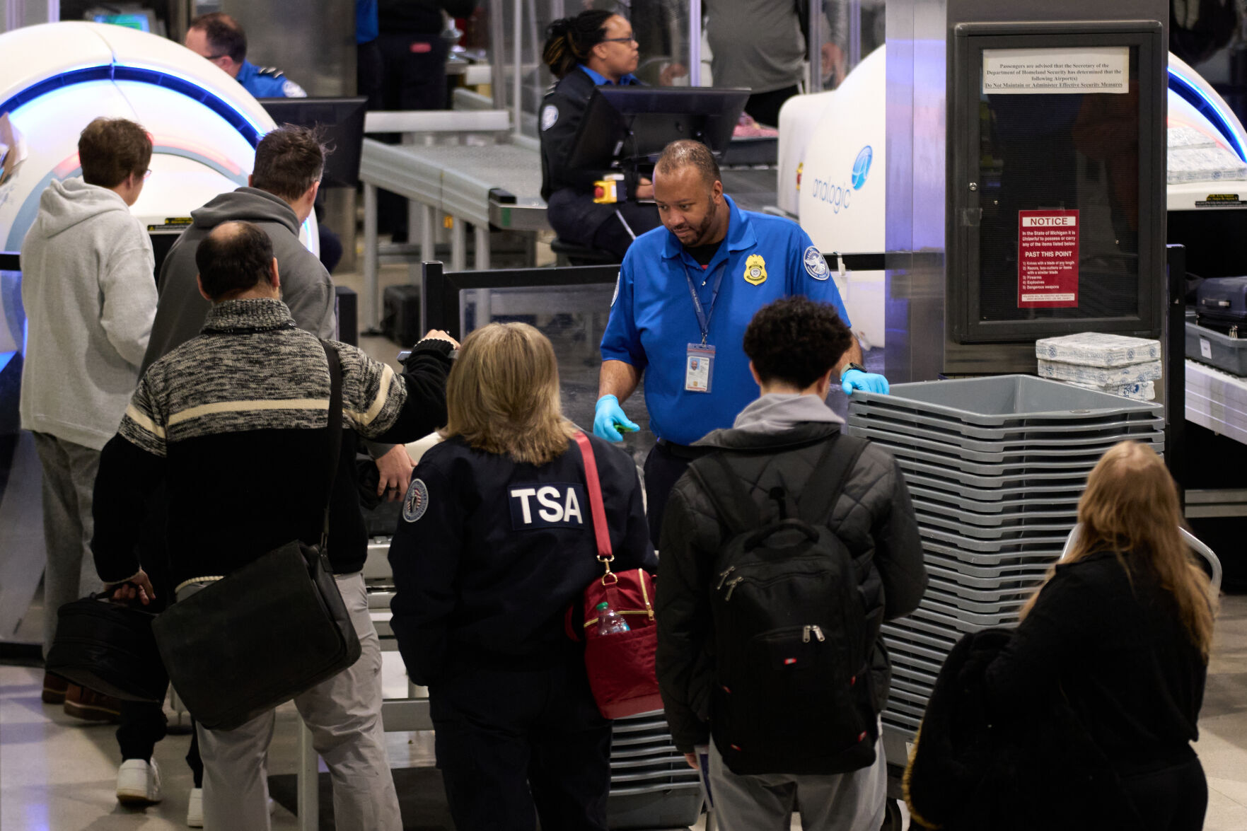TSA agents work without pay due to another shutdown