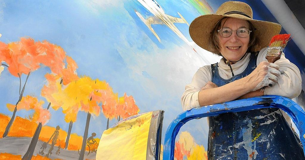 Artist creates transportation mural at museum