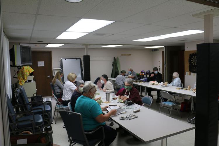 Carving out social time: Senior Center woodworking class members enjoy ...