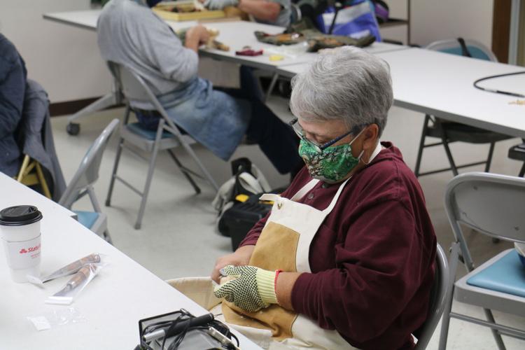 Carving out social time: Senior Center woodworking class members enjoy ...