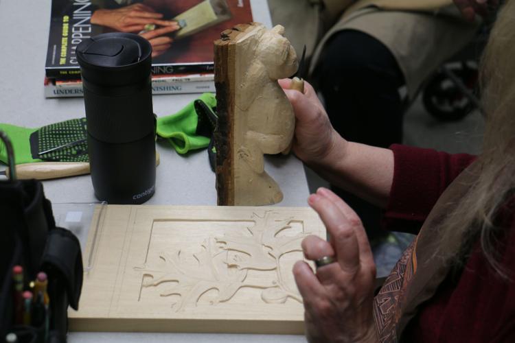 Carving out social time: Senior Center woodworking class members enjoy ...