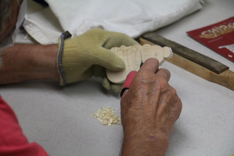 Carving out social time: Senior Center woodworking class members enjoy ...