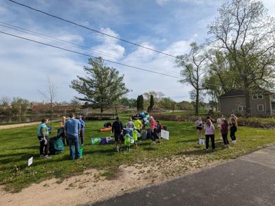 Spring cleaning: Community clean-up day spruces up area parks ...