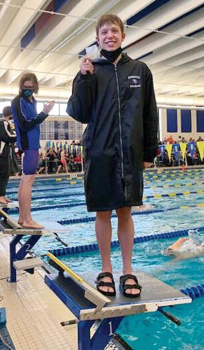 Boys swimming: Evan Schmidt sets pool record, Stoughton qualifies for ...