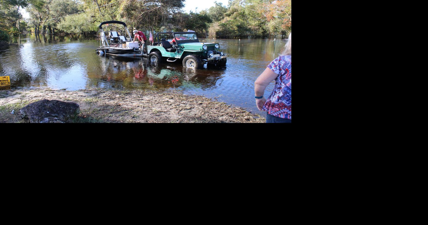 PARADISE LOST: Residents face long recovery after flooding devastates ...