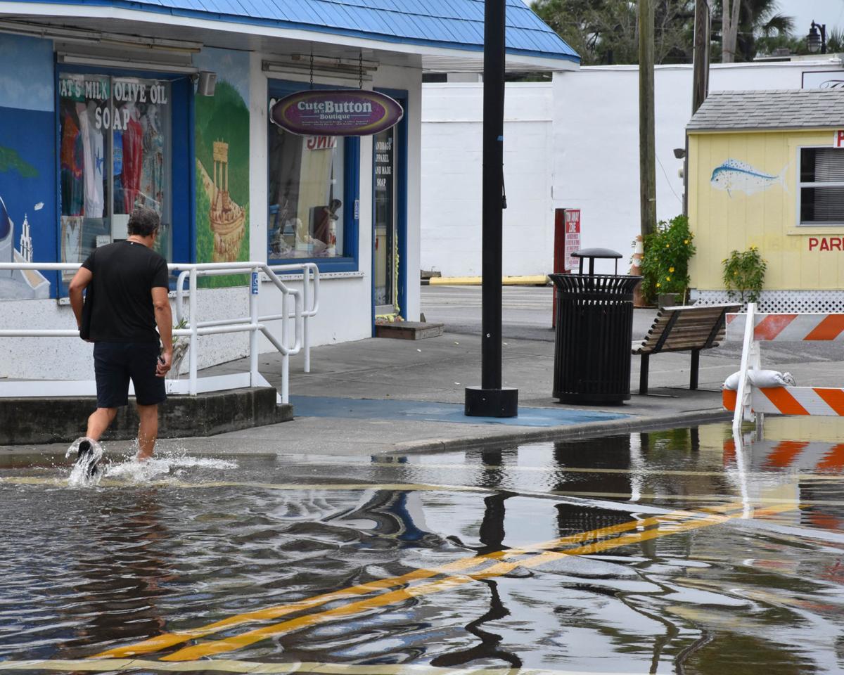 Tidal flooding again closes Sponge Docks main street | | suncoastnews.com
