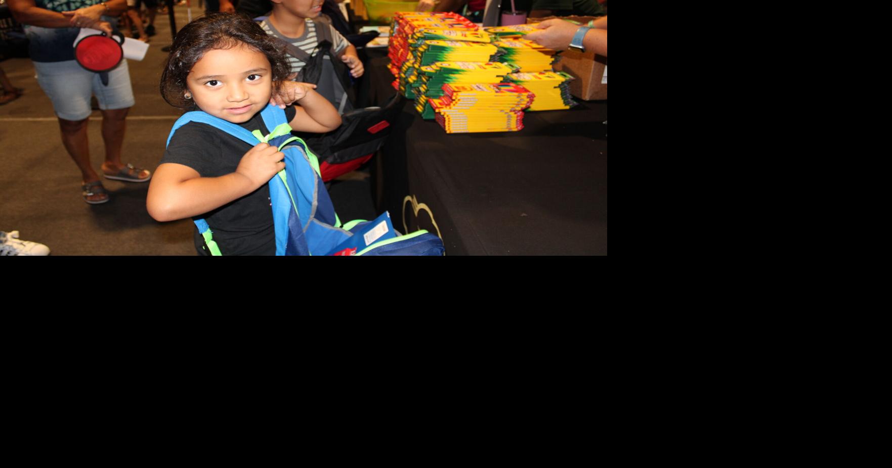 Children get supplies for school at Grace World event | News ...