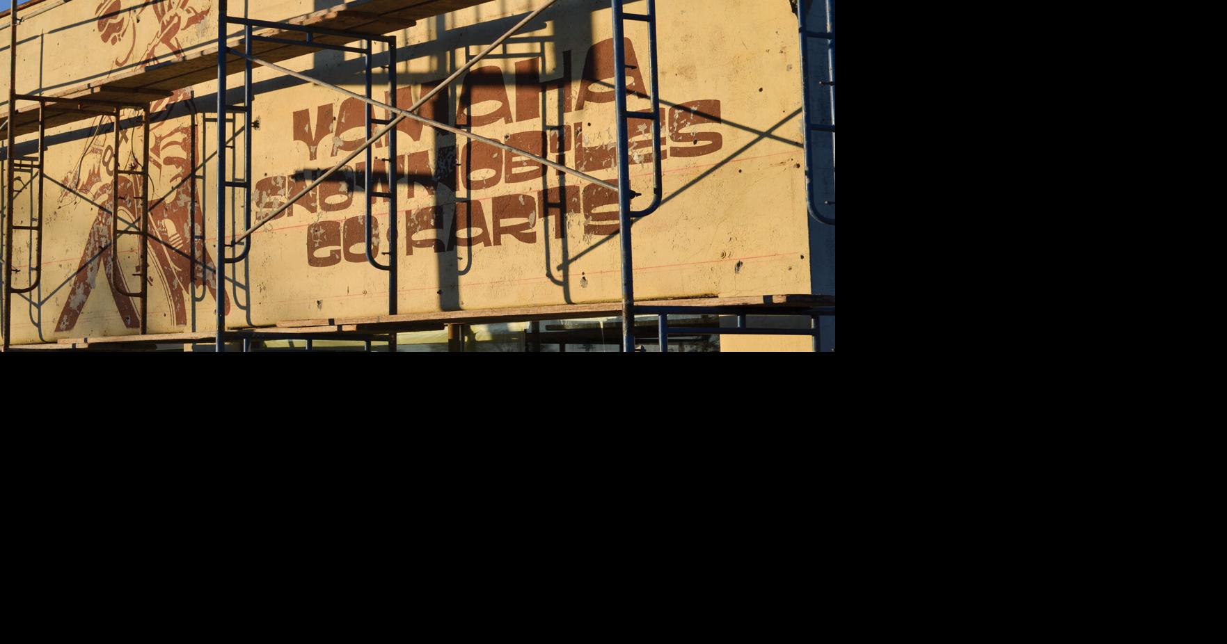 Historic motorcycle shop sign uncovered in Sunnyside | Business ...