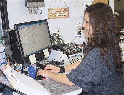 Police department receptionist enjoying new duties | Archive ...