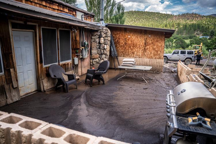 Residents, authorities struggle to mitigate post-fire flooding ...