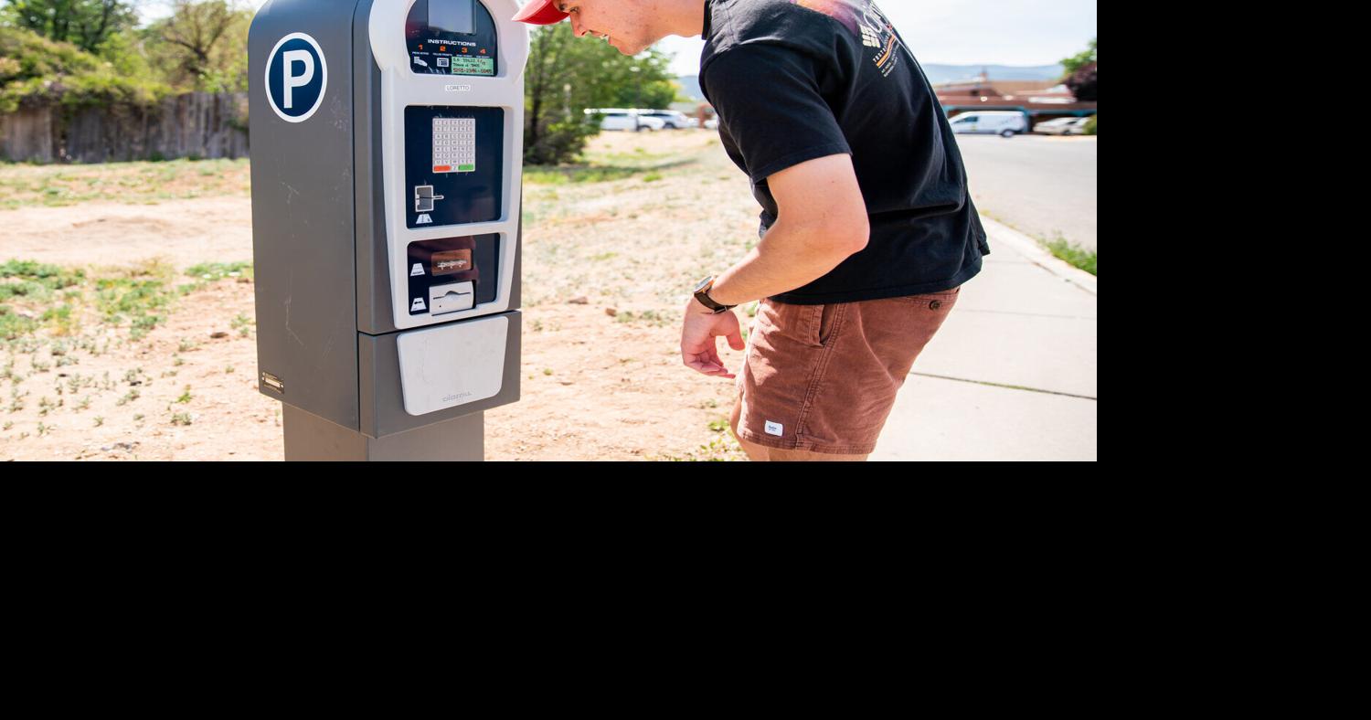 Parking fees paused through October | Local News | taosnews.com