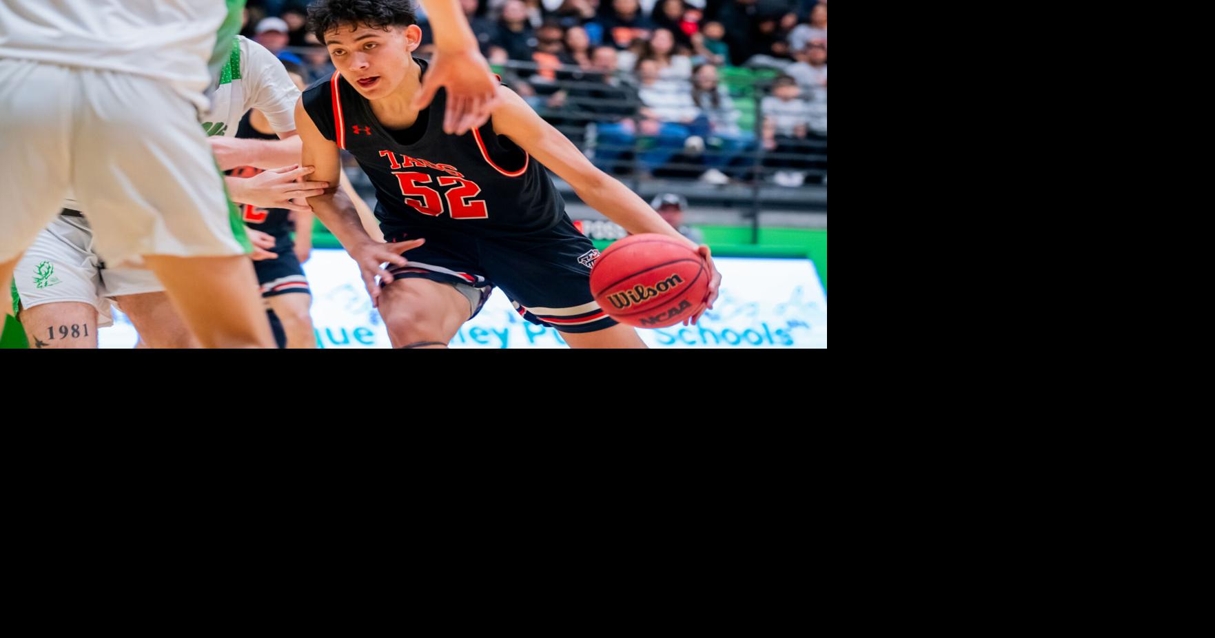 Taos Tigers take down Pojoaque Elks in round one of state basketball ...