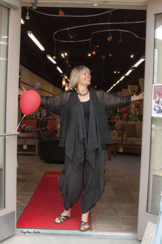 Mary Domito opens the doors for business in Alamosa. | | taosnews.com