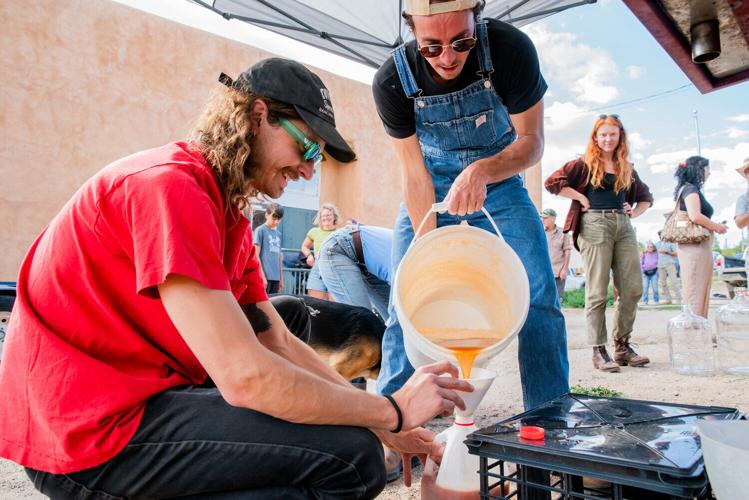 San Cristobal enjoys cider, community at annual apple pressing ...