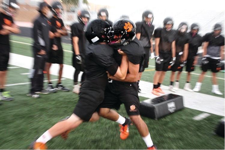 Taos Tigers suit up, start the 2018 season looking like a lean machine ...