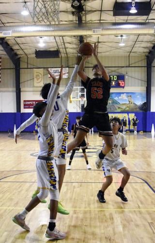 Taos Tigers basketball secures road win in Cuba | Basketball | taosnews.com
