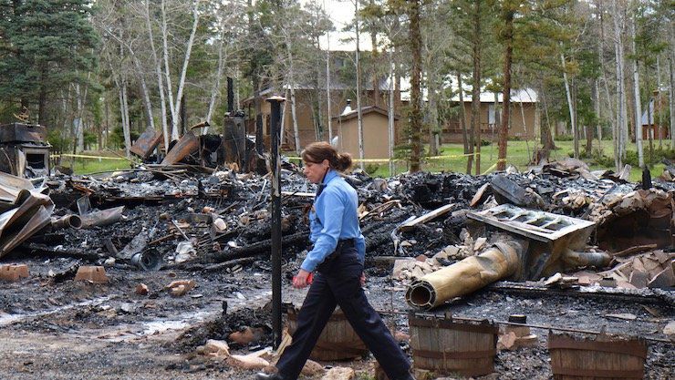 Angel Fire Police search ashes after house fire, officer-involved ...
