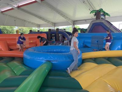 Inflatable fun: Wildcat Mentors celebrate with end-of-year bash | News ...