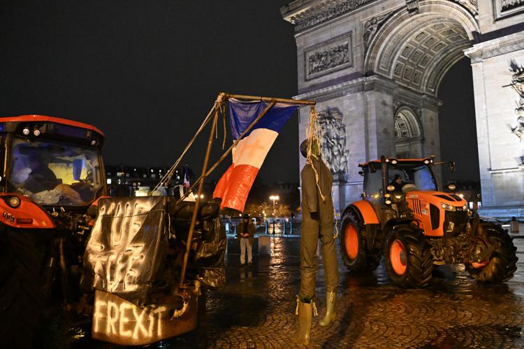 Farmers drive tractors through Paris and block highways in Greece to ...