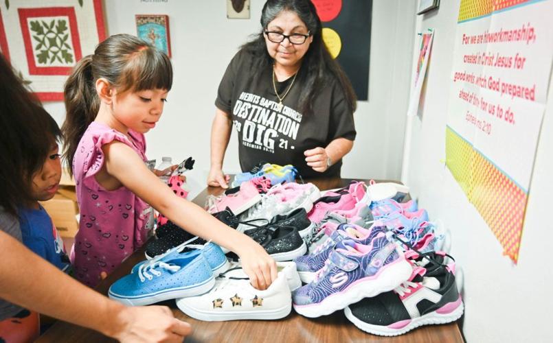 Saving souls with new soles: children receive new shoes during ministry ...