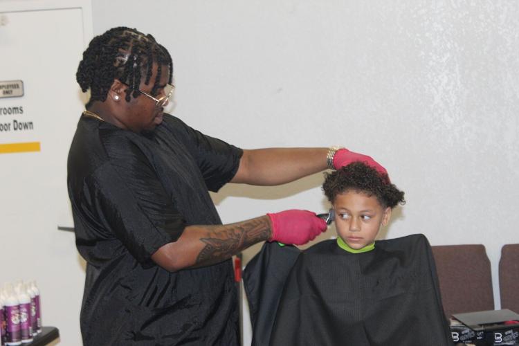 Hundreds attend back-to-school block party, receive supplies and ...