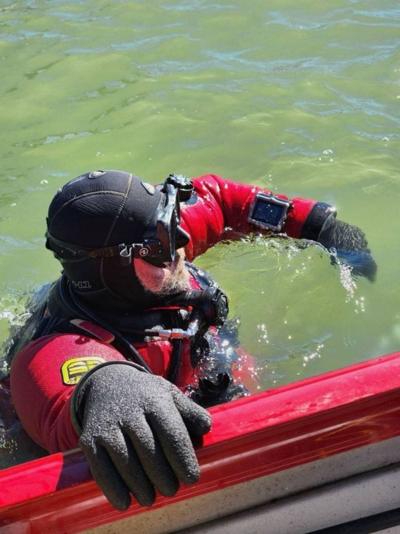 A few brave men and women: Volunteer dive team members recover many ...