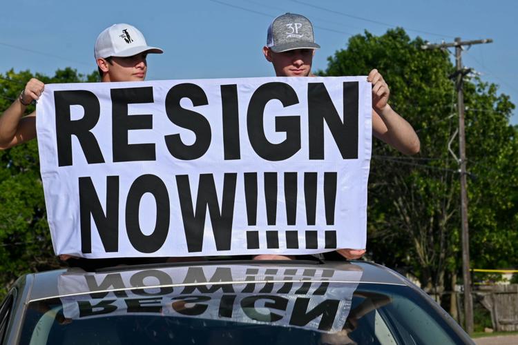 Students protest Buckholts ISD trustees; School board members urged to ...
